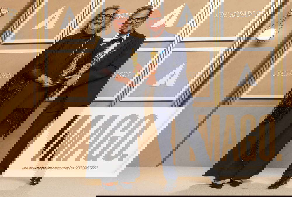 Ernestine Hipper and Christian M. Goldbeck pose with their Oscars for ...