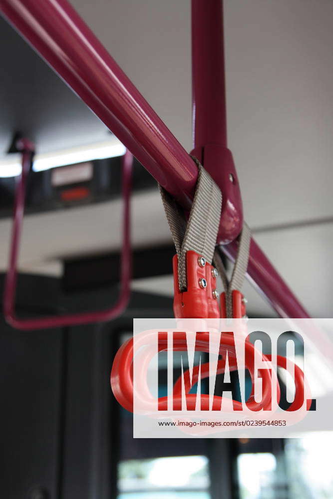 Bus hand-rail and handhold