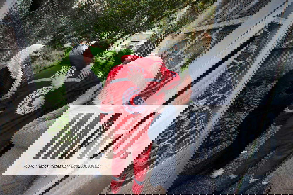 Palestinian Red Crescent ambulance officer Fawaz Al-Bitar, is welcomed ...