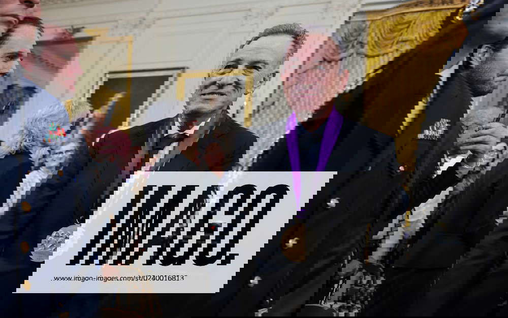 Bruce Springsteen walks off the stage after an event with President Joe ...