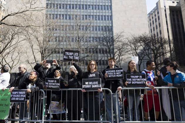 New York, New York, USA: People hold signs that read We Believe Stormy ...