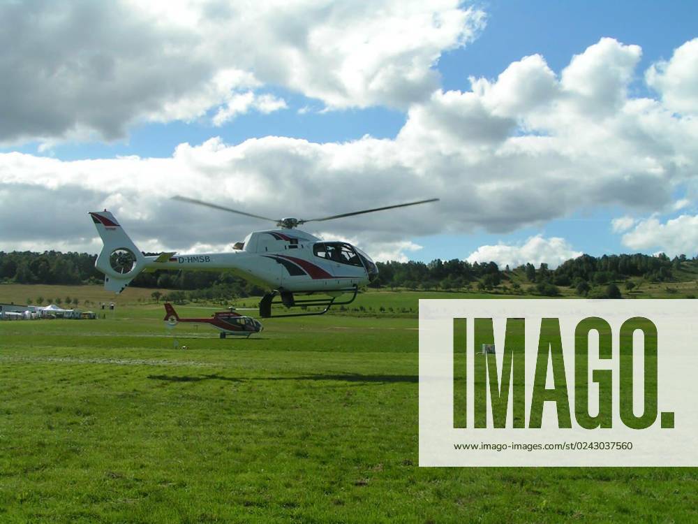 Helicopter takes off from the meadow, , property released