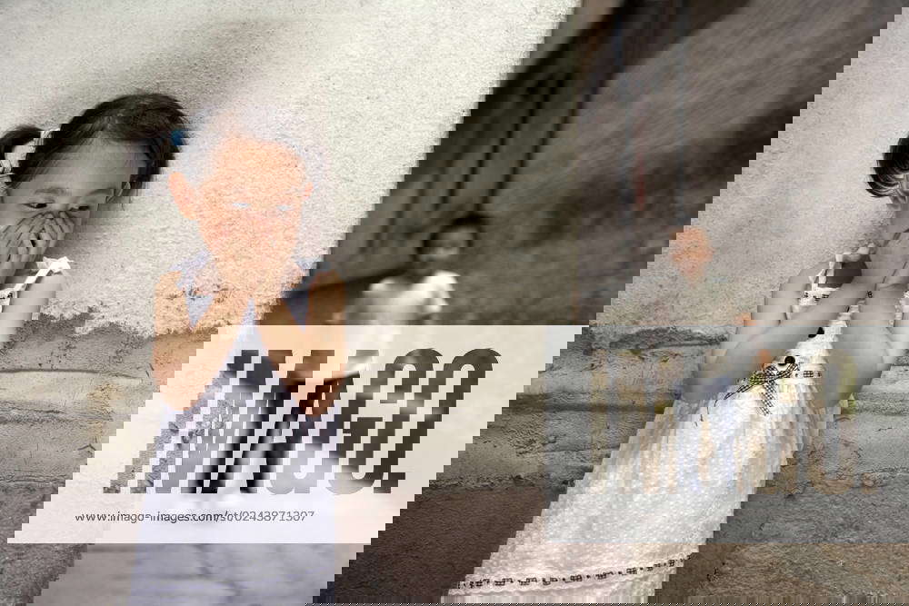 Chinese children playing hide and seek Beijing