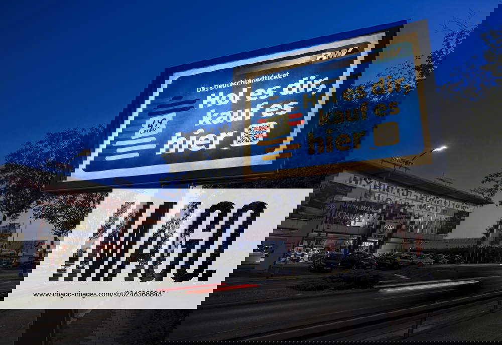 Advertising poster for the Germany ticket on a busy highway Offenbach ...