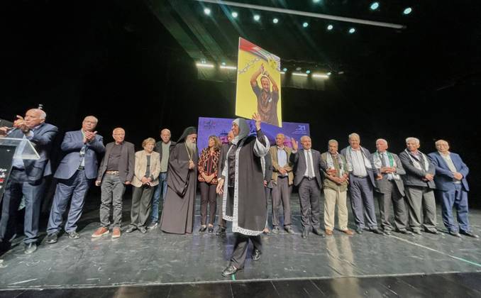 Palestinians attend a ceremony marking the 21st anniversary of the ...