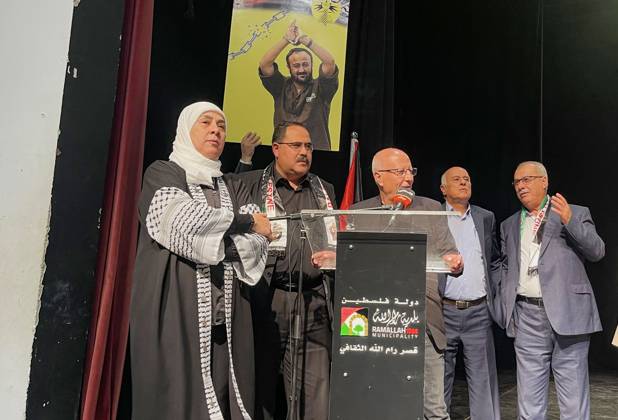 Palestinians attend a ceremony marking the 21st anniversary of the ...