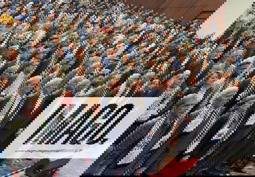 Palestinians attend a ceremony marking the 21st anniversary of the ...