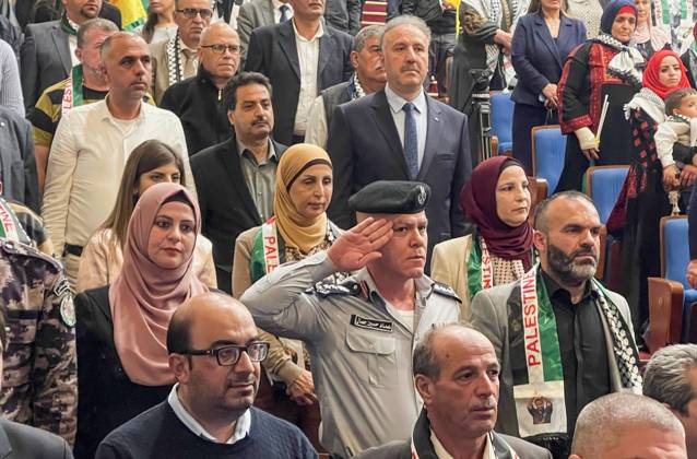 Palestinians attend a ceremony marking the 21st anniversary of the ...