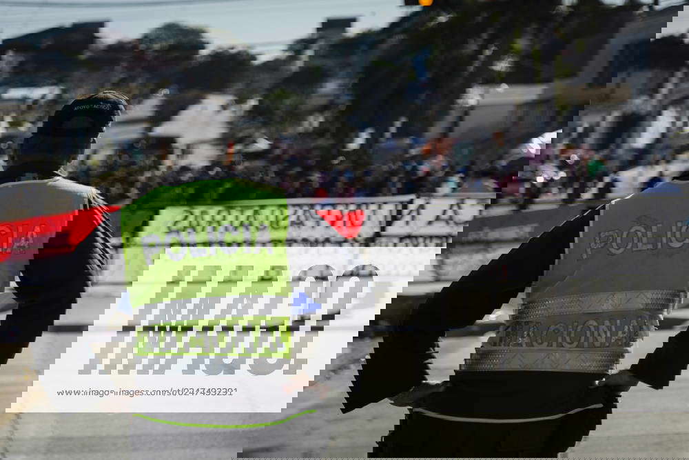 Asuncion, Paraguay: Police officer stands guard as people gather during ...