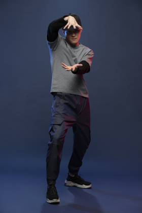 Studio shot of fashionable young Chinese man dancing Beijing China