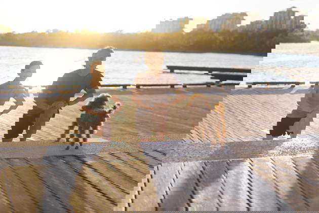 Happy mature Chinese couple having a rest after exercising Beijing China