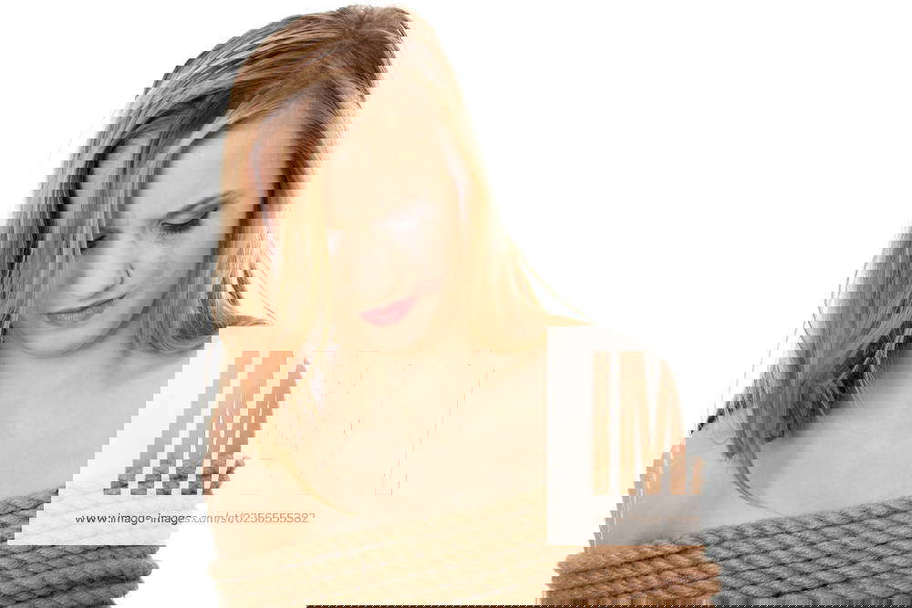 The beautiful blond girl tied with rope - kidnapping