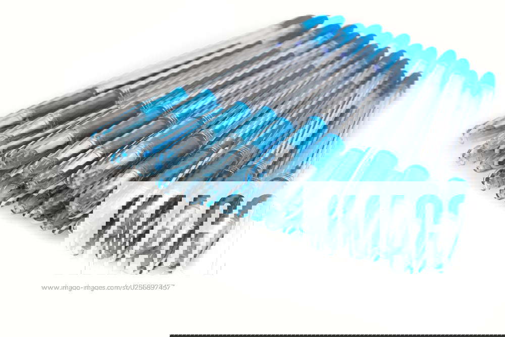 Bunch of blue pens on white background