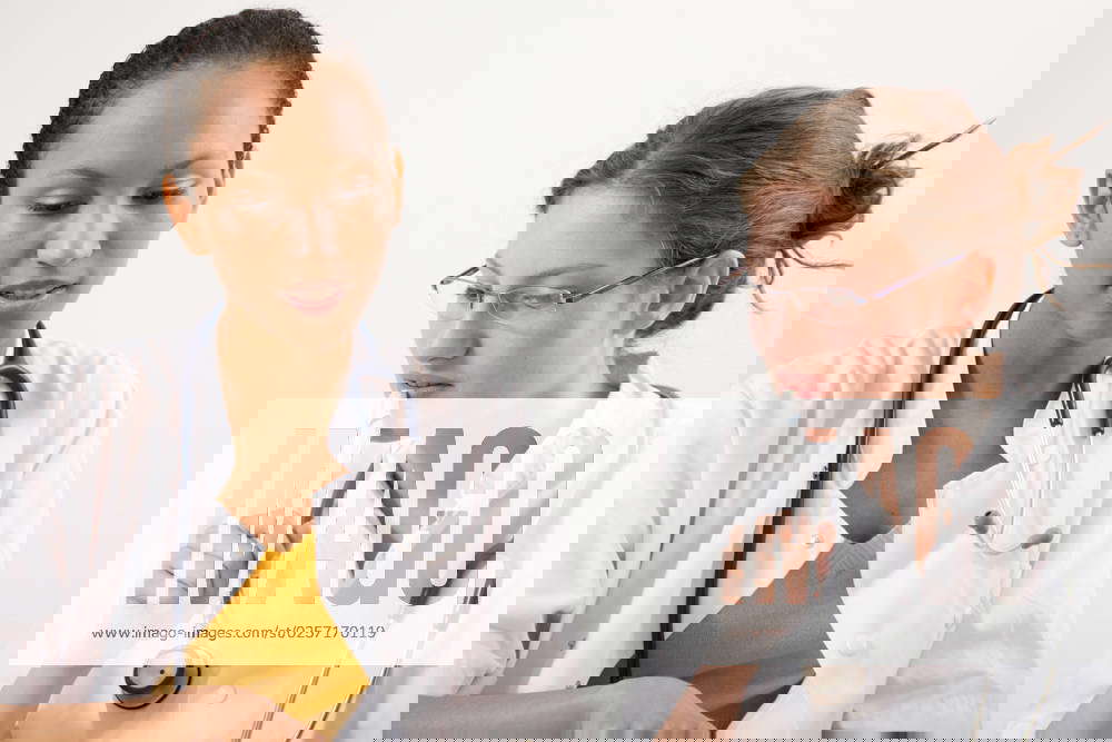 Two medical students discussing something together in the