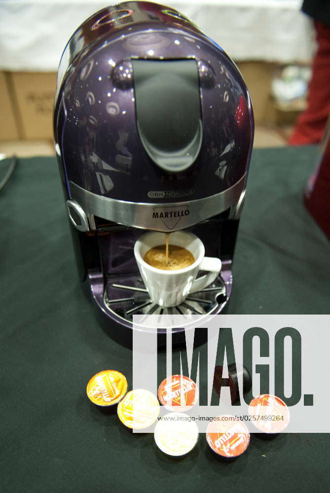 STOCKHOLM 20101118 The coffee machine, a brewer with coffee capsules ...