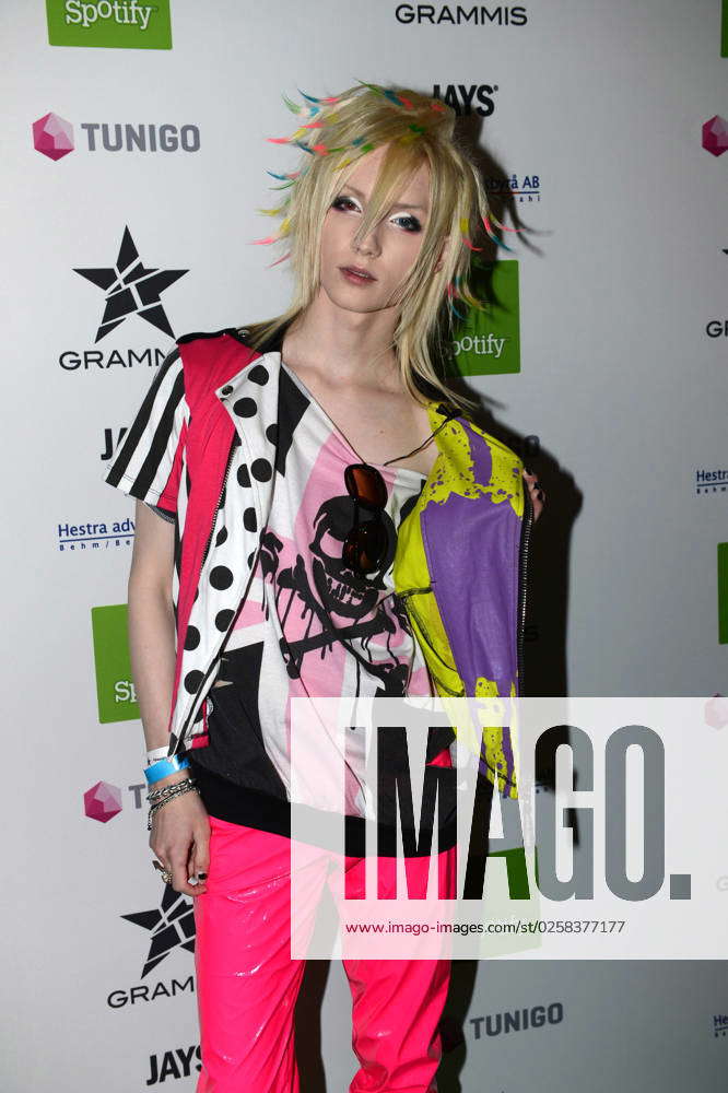 STOCKHOLM 20130220 Recording artist Yohio arrives at the 2013 Grammy ...