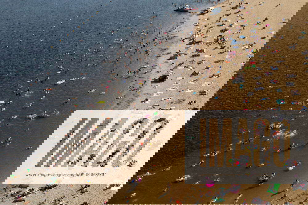 RUSSIA, YAKUTSK - : An aerial view of a crowded beach by the Lena River ...