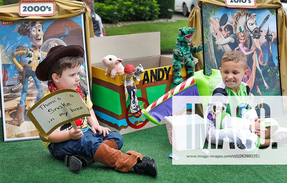 Syndication: The Patriot Ledger Kids on a Disney themed float dressed ...