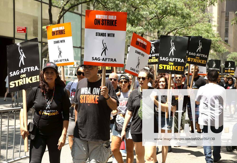 July 14, 2023, New York City, New York, USA: Picketers hold signs ...
