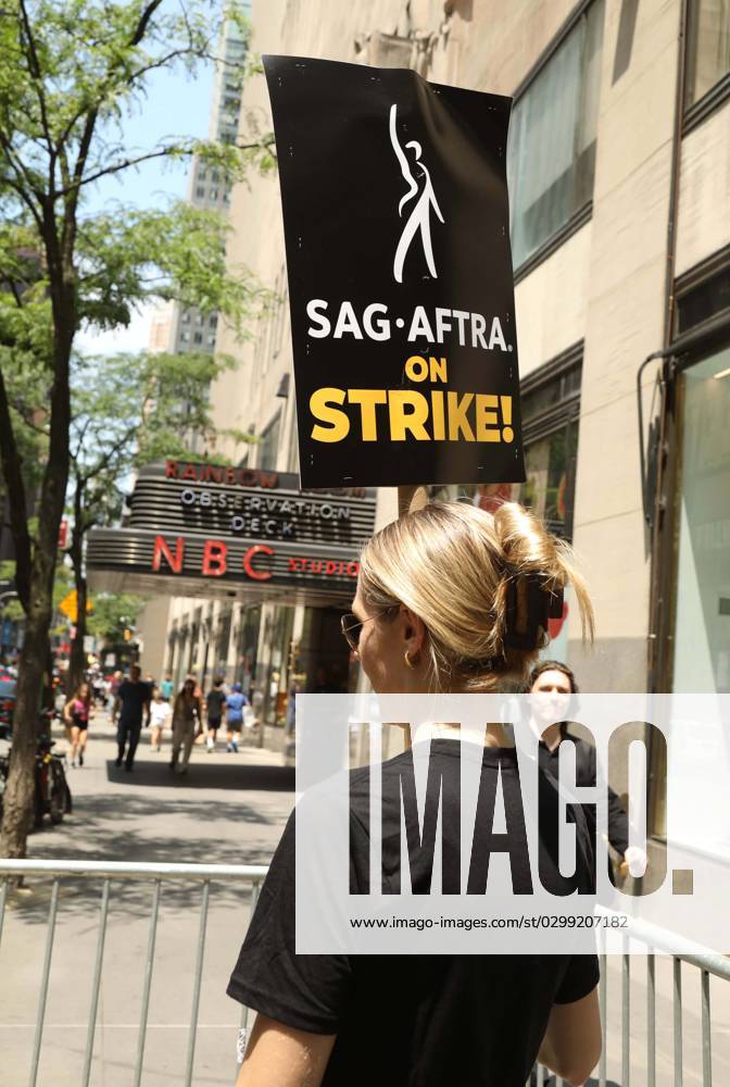 July 14, 2023, New York City, New York, USA: Picketers hold signs ...