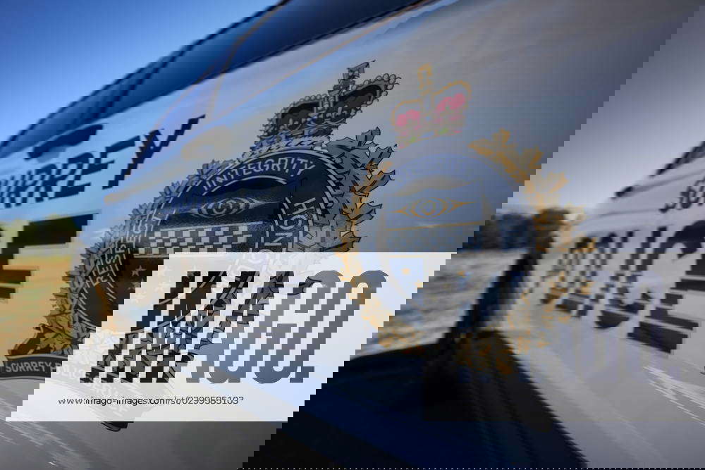 SURREY, BC, CANADA: A Surrey Police crest is seen on the side of one of ...