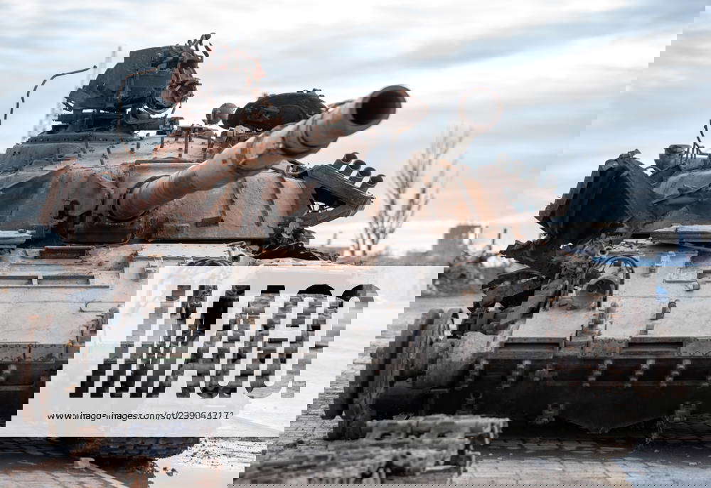 Damaged military tank on a city street in Ukraine damaged military tank ...