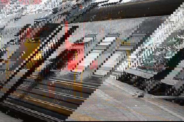 RUSSIA, MOSCOW - : A car attendant is seen by the Night Express train ...