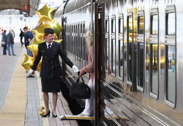 RUSSIA, MOSCOW - : A car attendant is seen by the Night Express train ...