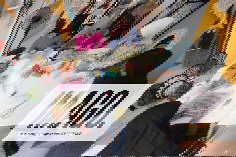 Palestinian girls learn the handicrafts such as weaving and wooden loom ...