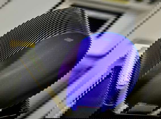 NIJMEGEN - A so-called wafer on which chips are made in the factory of ...