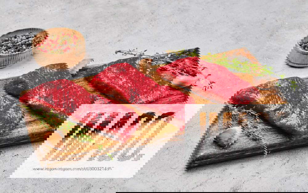 raw fresh Strip Steak with Spices first-class Beef