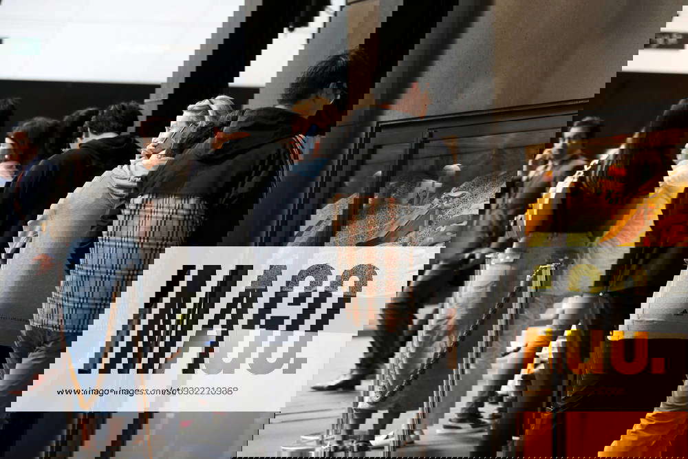 RETAIL STOCK, People line up in a queue as they wait to enter a retail ...