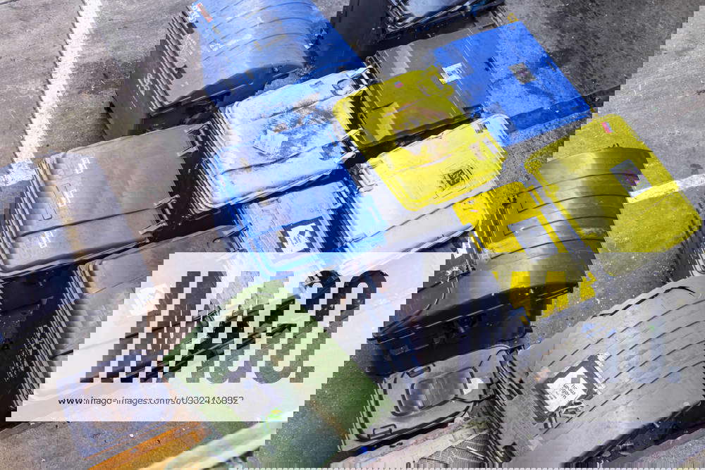 Dumpster with flaps in different colors for household waste collection ...