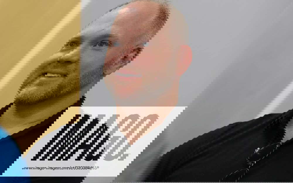 Syndication: Detroit Free Press Chris Hutchinson watches as his son ...