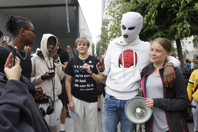 Greta Thunberg and Swedish rapper 1 Cuz during a climate strike at ...