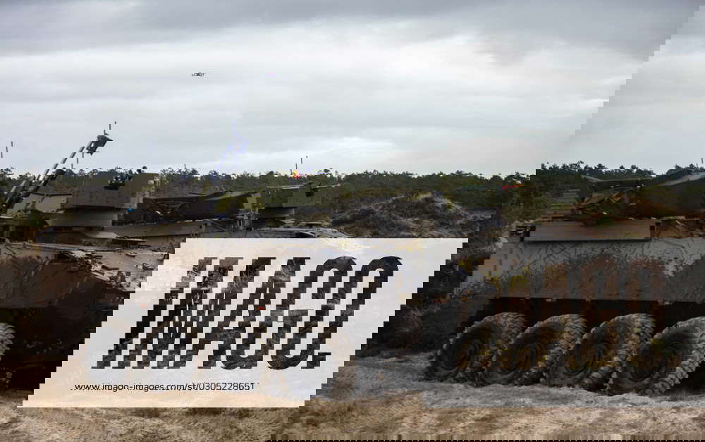 Danish soldiers assigned to the 1st Artillery Battalion conduct live ...