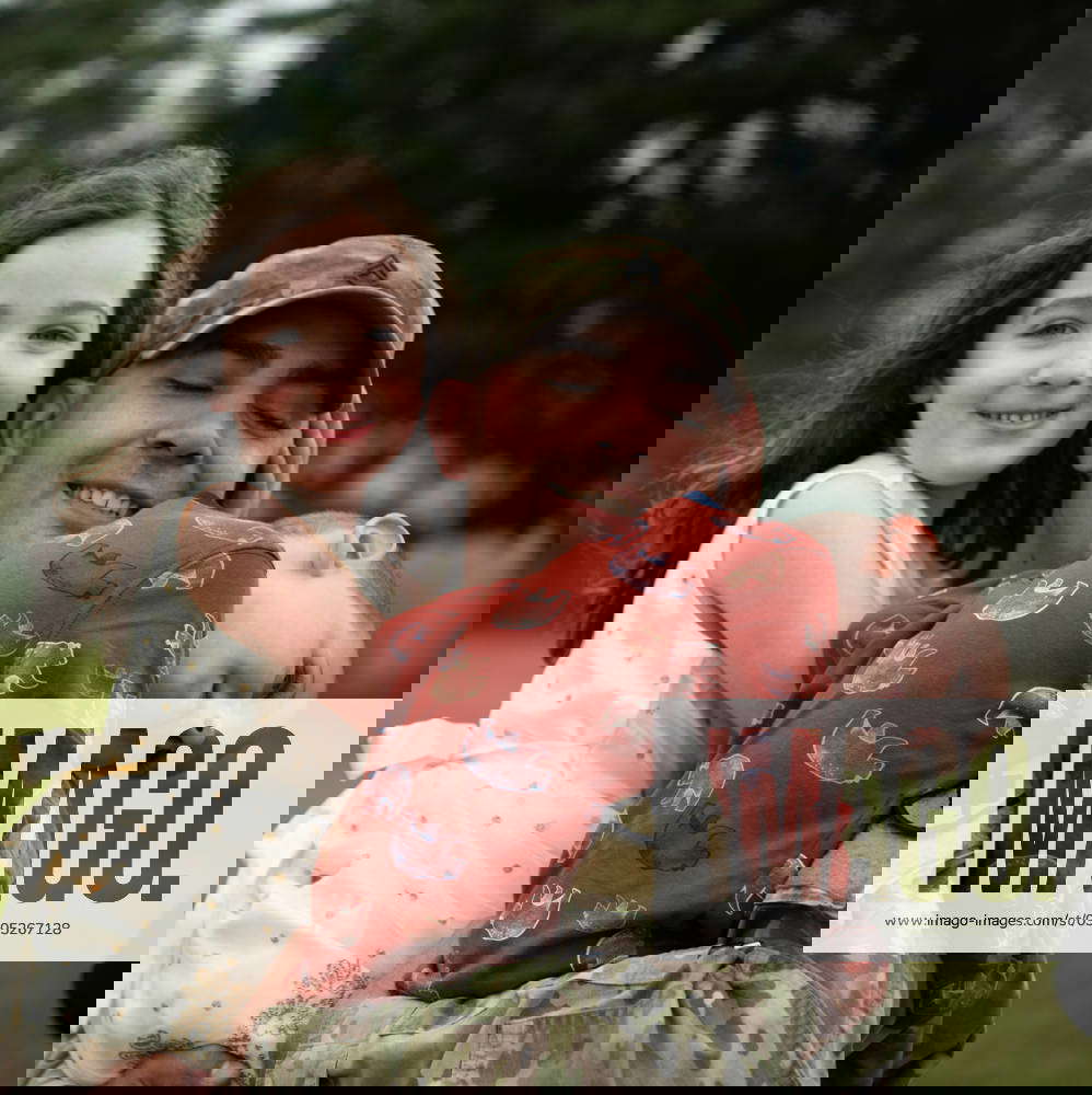 NORTH LITTLE ROCK, Ark. Sgt. Israel Sanchez holds his daughter, Azimuth ...