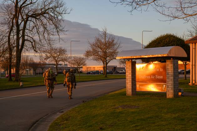 U.S. Army Sgt. Joseph Voss and Pfc. Shamar Cerant lead the ruck march ...