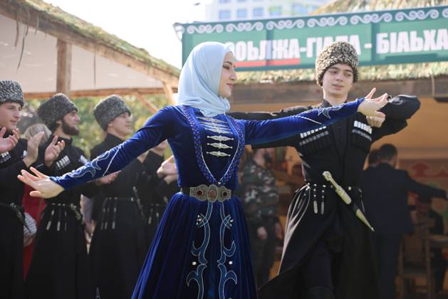 RUSSIA, GROZNY - : People wear traditional Chechen costumes during ...