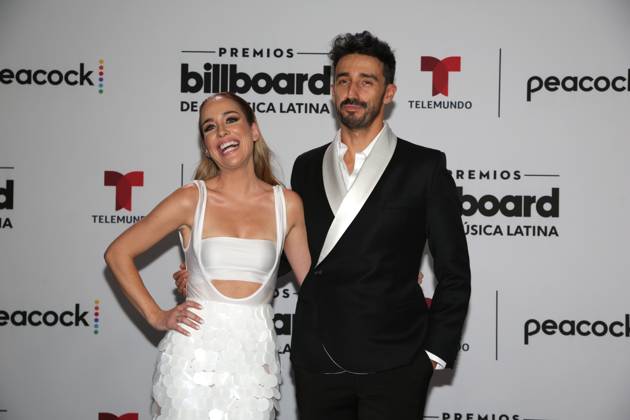 Spanish journalist Carlota Vizmanos and youtuber Toniemcee pose on the ...