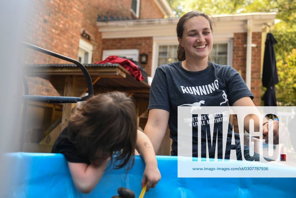 Syndication: The Augusta Chronicle Dr. Nicole Nelson plays with her ...