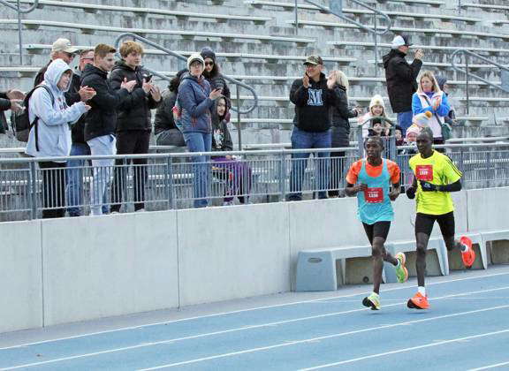 Syndication: The Des Moines Register Abraham Kipkemei, left, and Luke ...