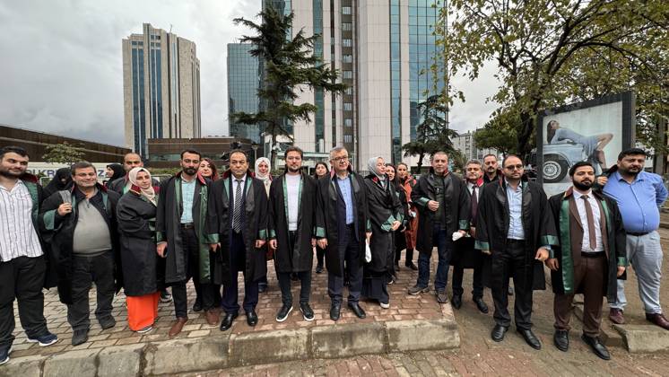Advocates in gowns are seen in front of the Israeli Consulate General ...