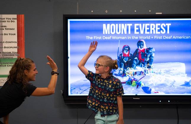 Syndication: Arizona Republic Deaf mountaineer Shayna Unger high-fives ...