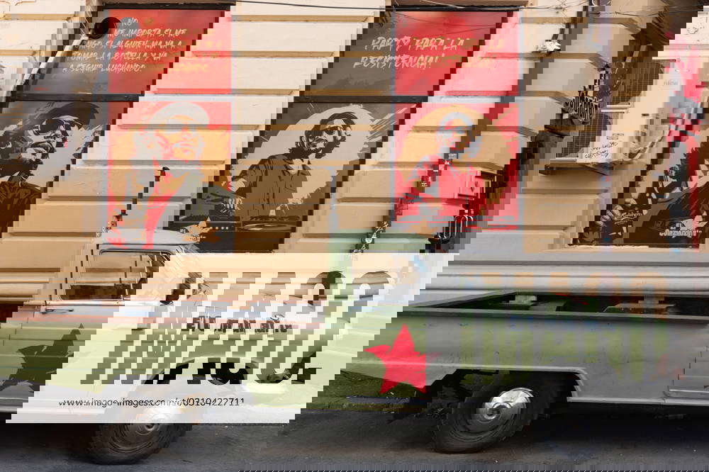 Historical view in Bucharest, Romania. A Soviet era car with Che ...