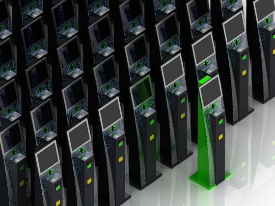 Rows of terminals to pay for services and one green terminal