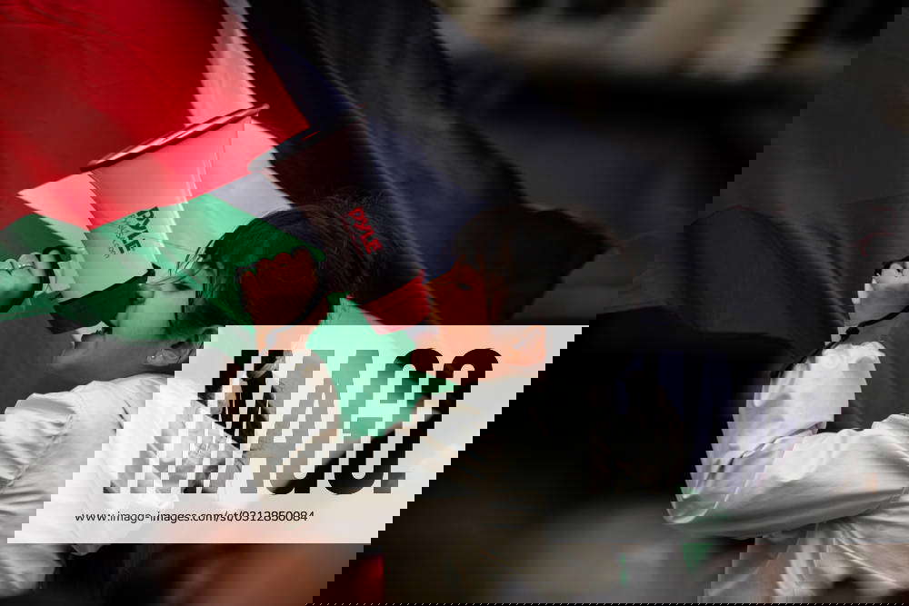 Paris, France: A kid chants slogans on a megaphone during the pro ...