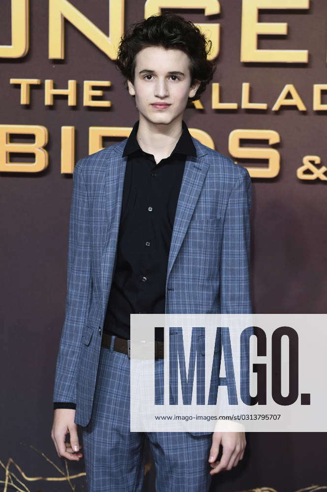 Max Raphael at the premiere of the movie The Hunger Games The Ballad of ...