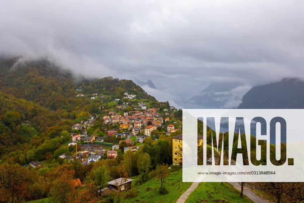 Aerial view via Mountain landscape and Alpine village Bre with Autumn ...