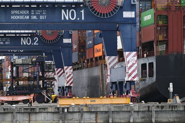 AUSTRALIA PORTS CYBER ATTACK, A container ship is unloaded at Port ...